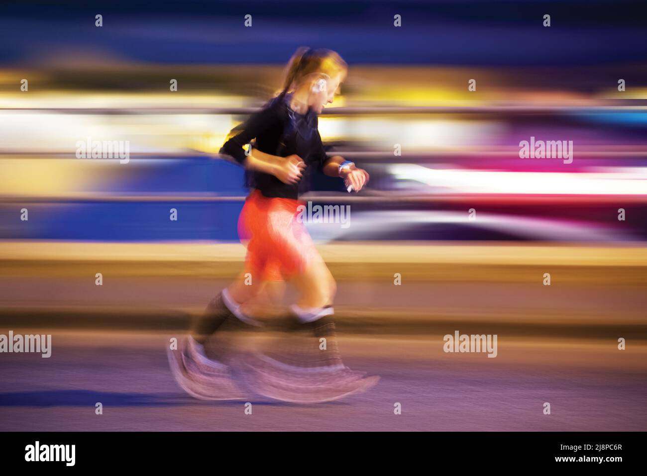 Woman running. Motion blur Stock Photo - Alamy