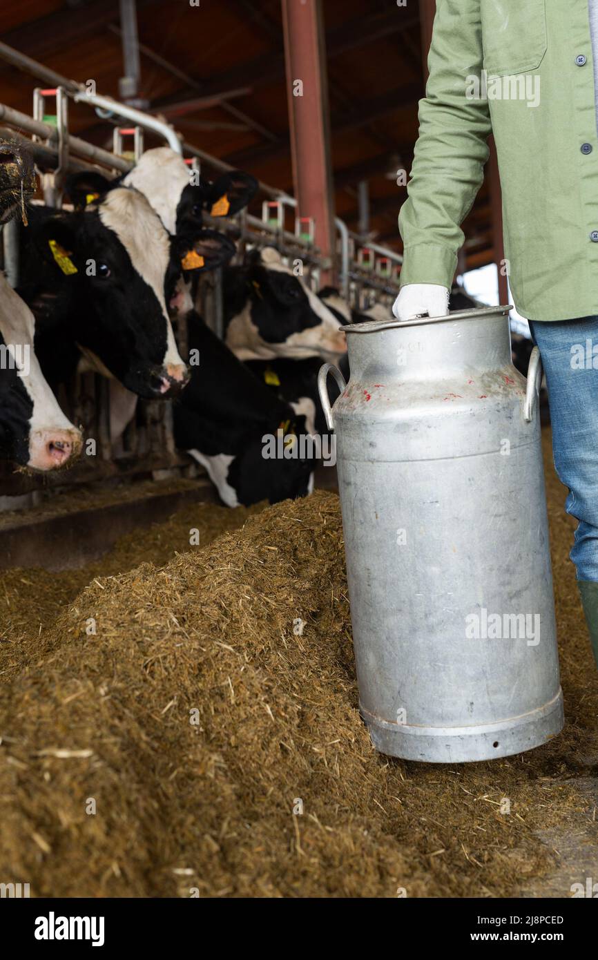 Carrying milk in metal container hi-res stock photography and images ...