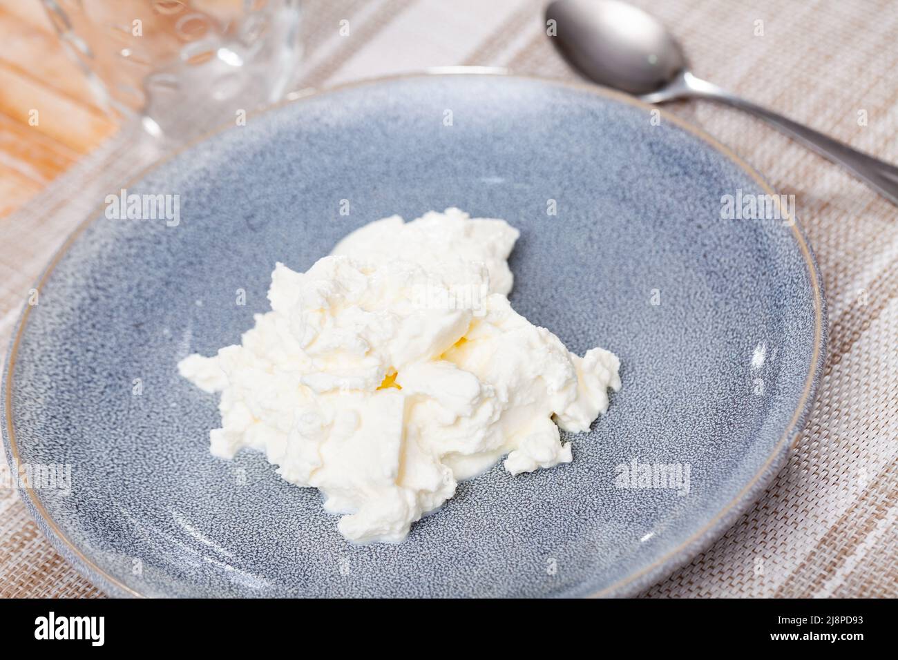 White soft whey cheese made from sheep milk Stock Photo - Alamy
