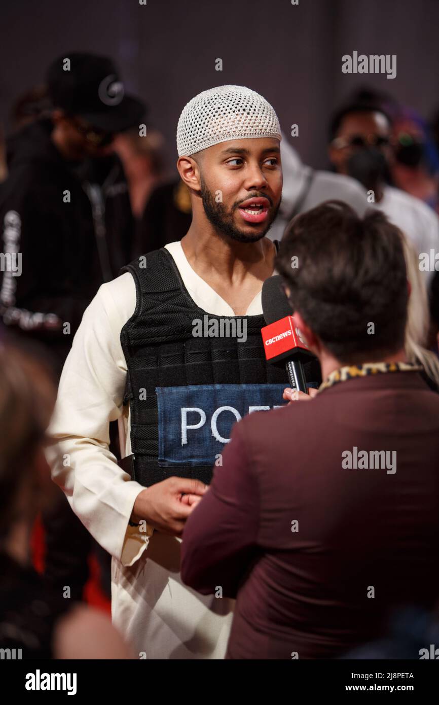 Mustafa The Poet being interviewed on the Red Carpet at the 2022 Juno ...