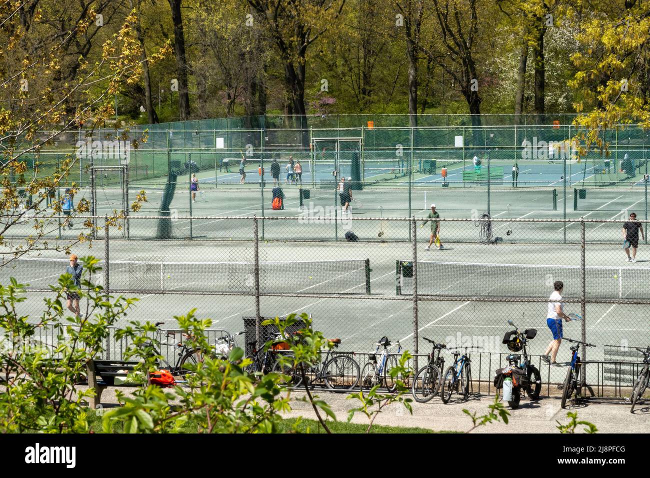 Players enjoying a spring afternoon at Central Park Tennis Center in ...
