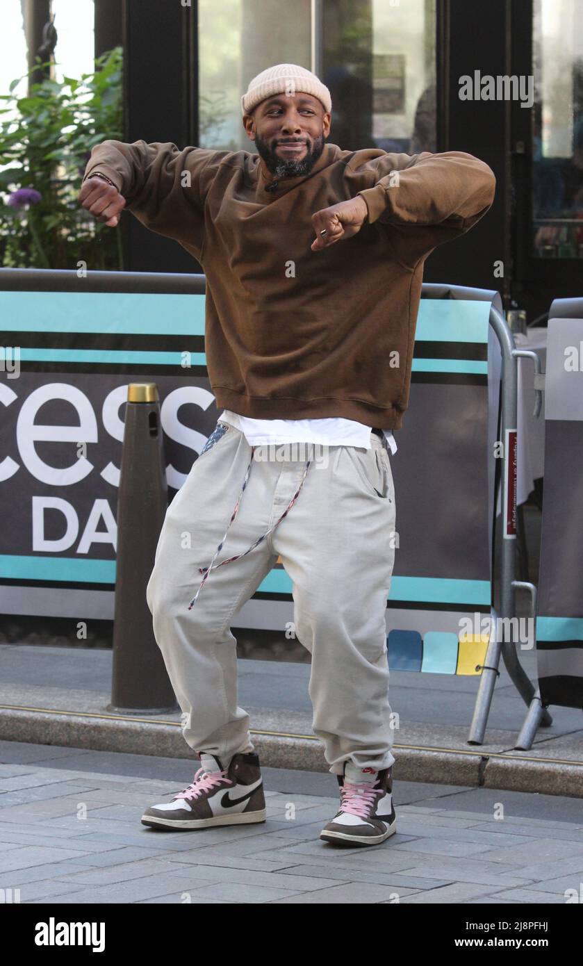 Stephen Boss, aka tWitch dancing on "Access Daily" outside NBC's Studio ...