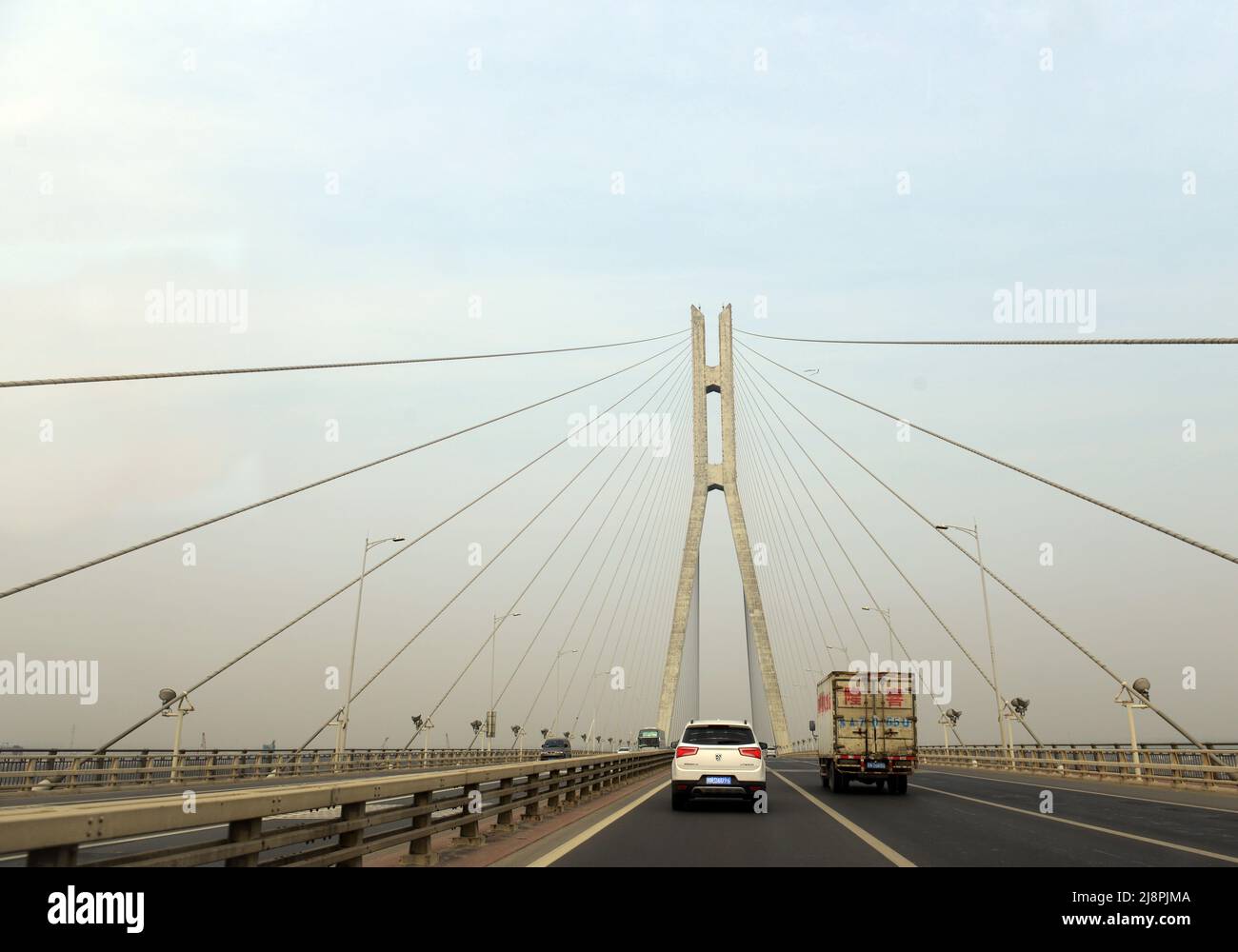 Driving on the Third Nanjing Yangtze River Bridge in Jiangsu province ...
