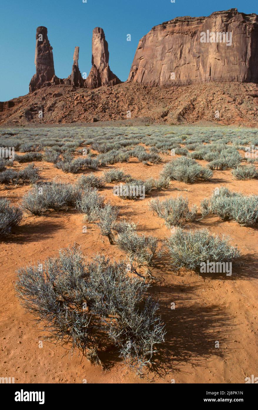 Three Sisters, Mitchell Mesa, Monument Valley, Arizona, USA Stock Photo ...