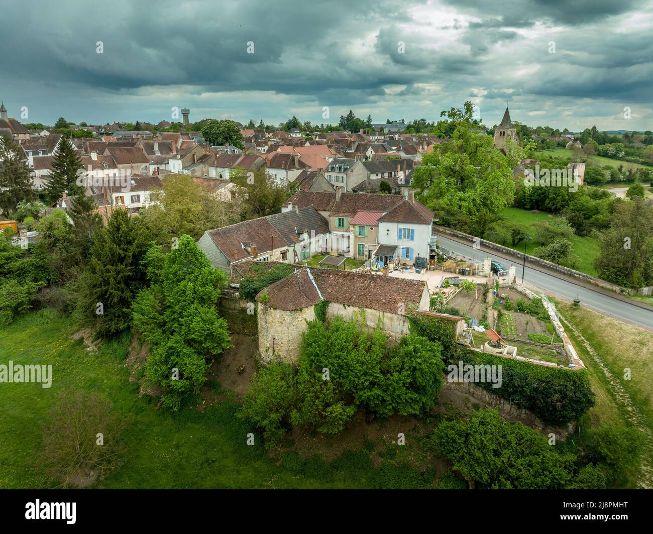 Aerial view of Ainay le Chateau from the east, small medieval town in ...