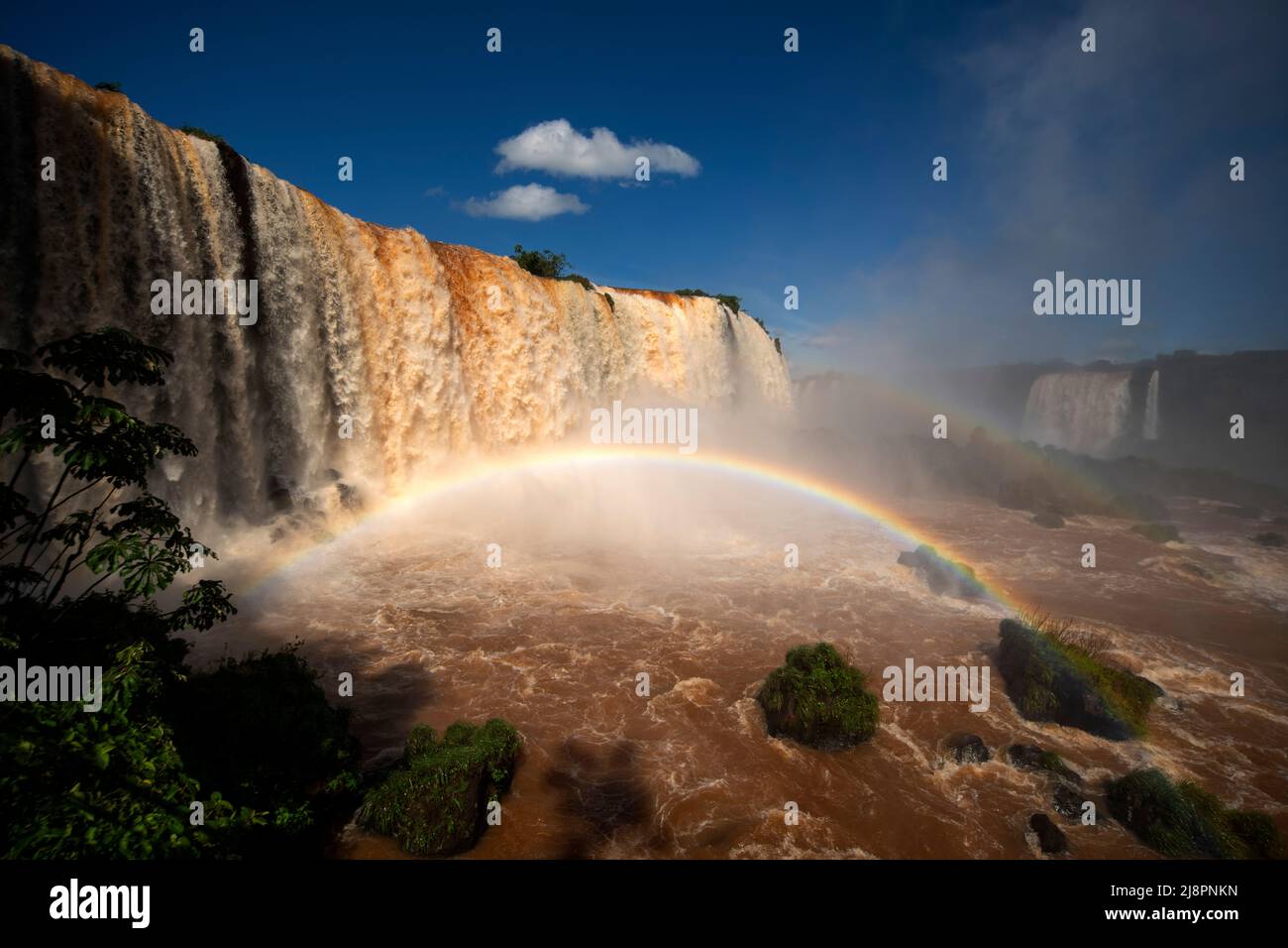 A rainbow on the Iguaçu Falls one of the biggest falls in the world ...
