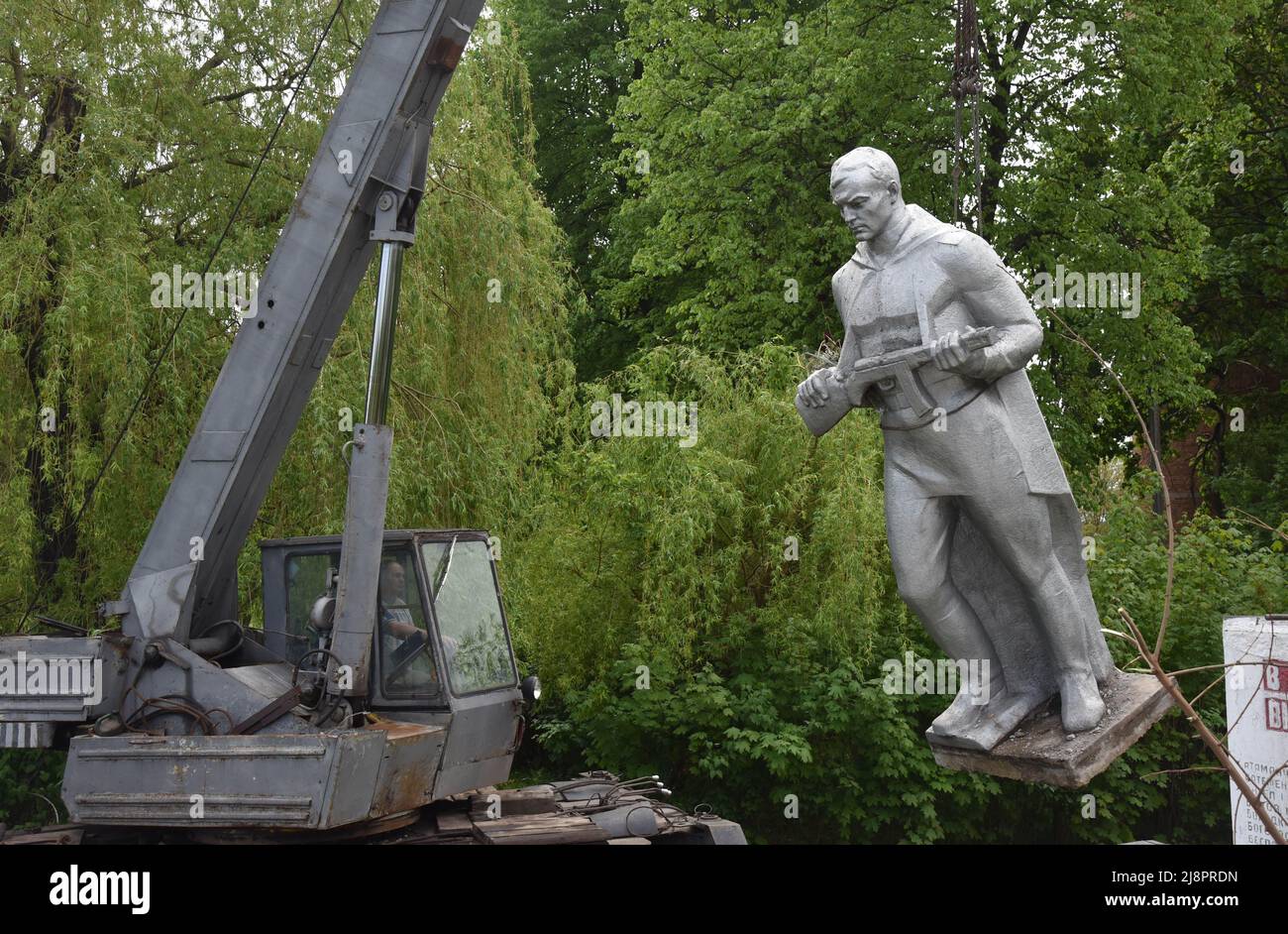 Chervonograd, Ukraine. 13th May, 2022. A crane lifts a sculpture of a ...