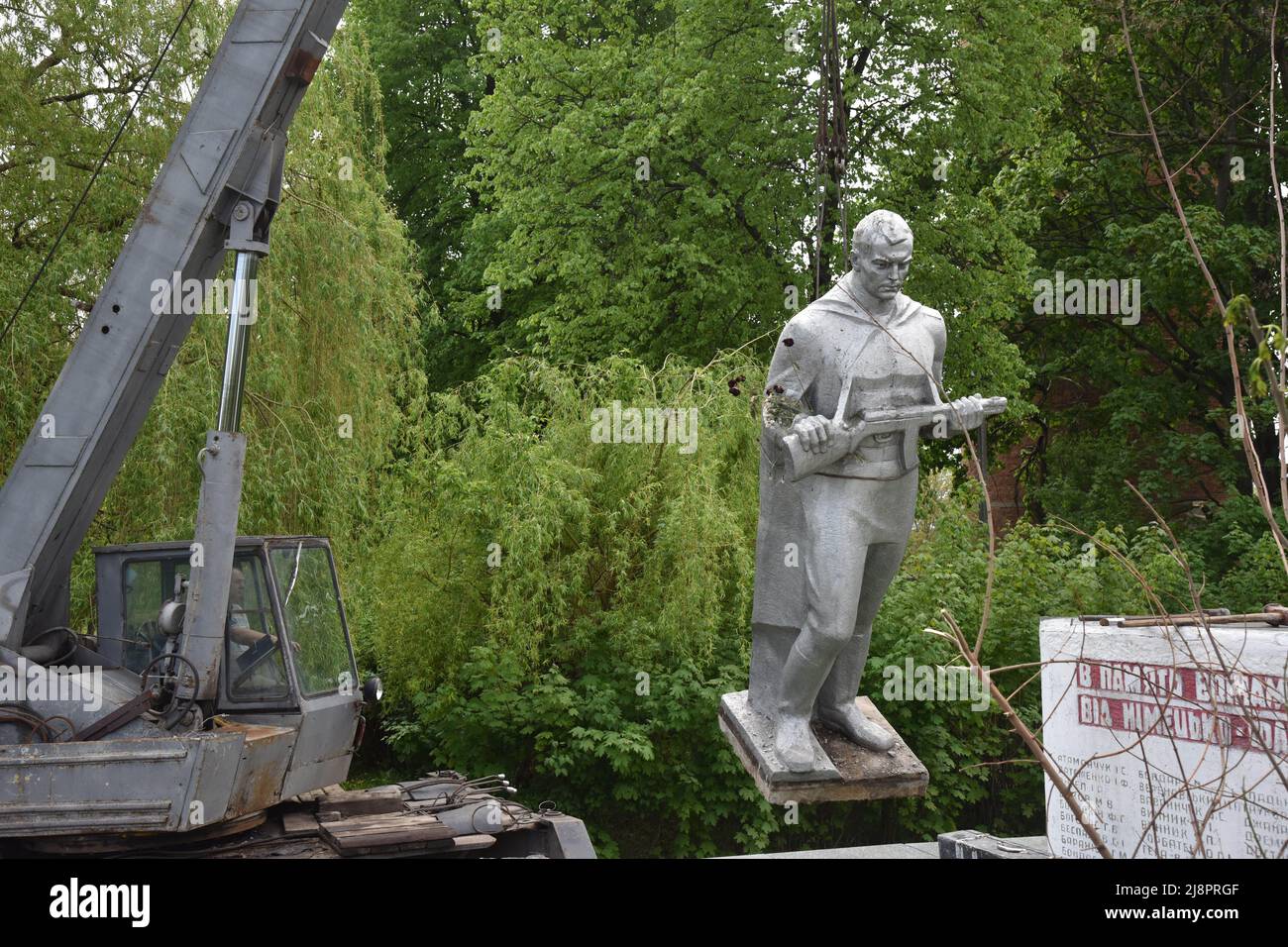 Chervonograd, Ukraine. 13th May, 2022. A crane lifts a sculpture of a ...