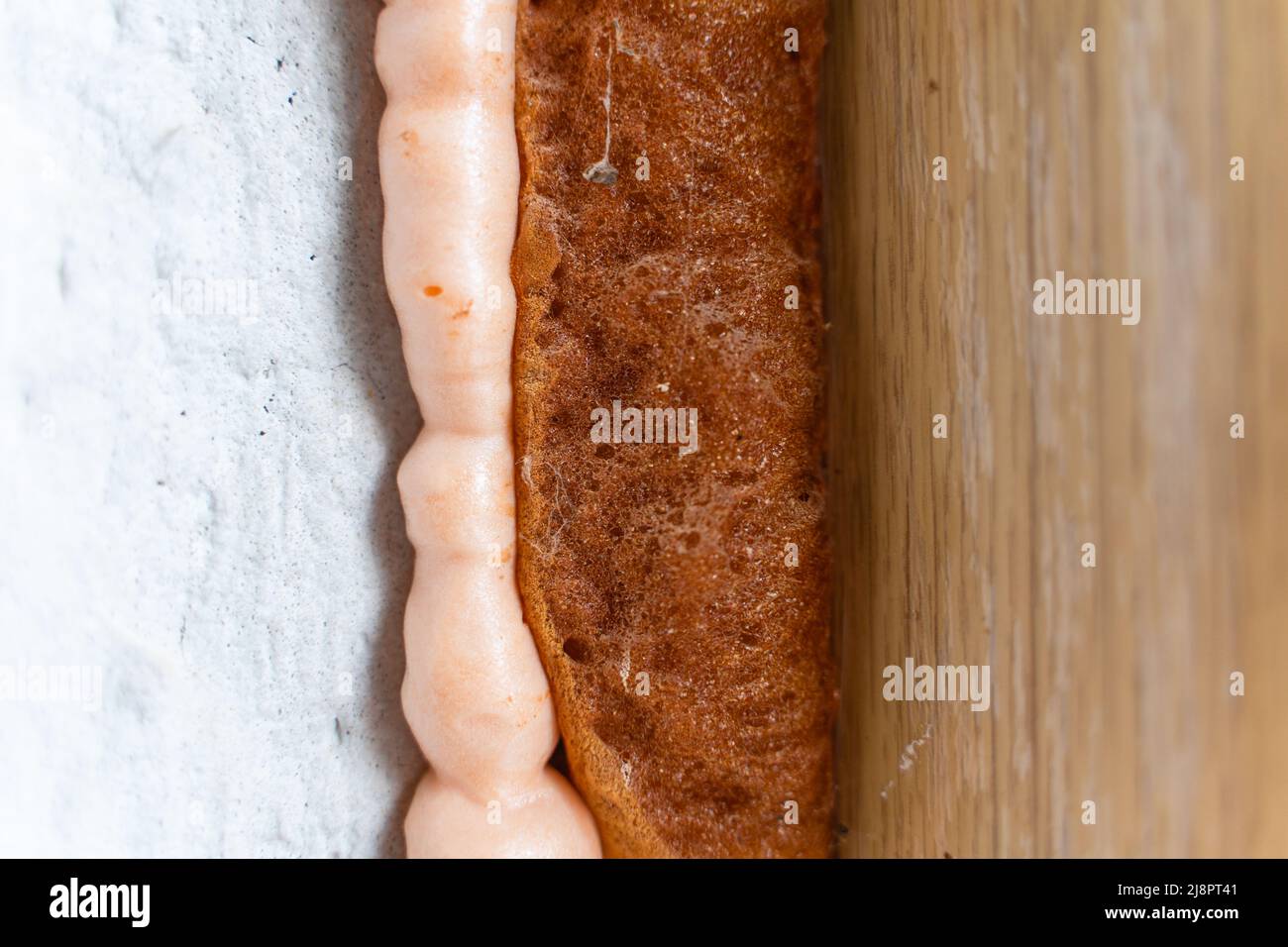 Comparison of old and fresh polyurethane foam. Pink and dark orange ...