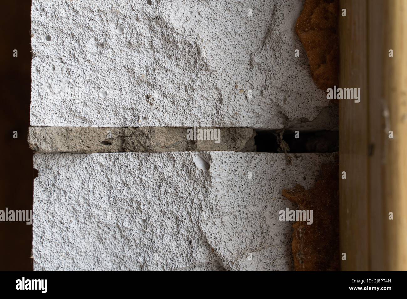 The gap between the window and the wall is filled with mounting foam ...