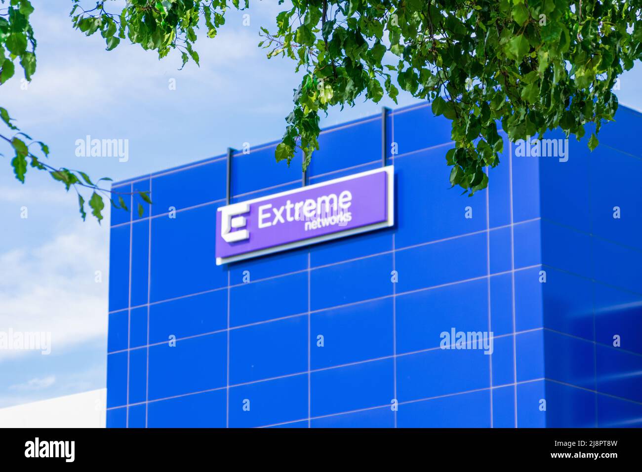 Blurred Extreme Networks logo at their headquarters in Silicon Valley ...