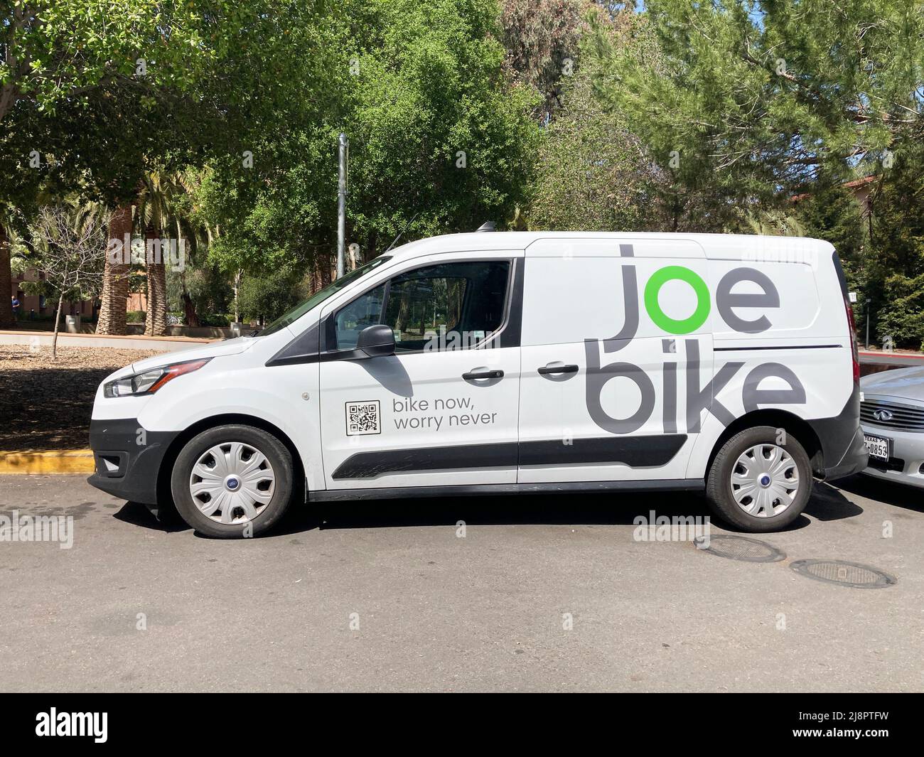 Joe Bike service van parked at a customer location. Side view - Palo Alto, California, USA ...