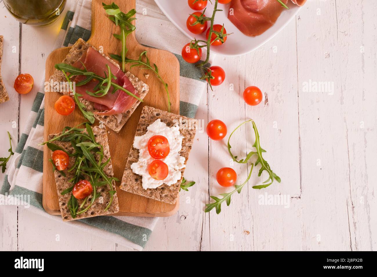 Crispy rye bread with sesame seeds, ham and cottage cheese Stock Photo ...