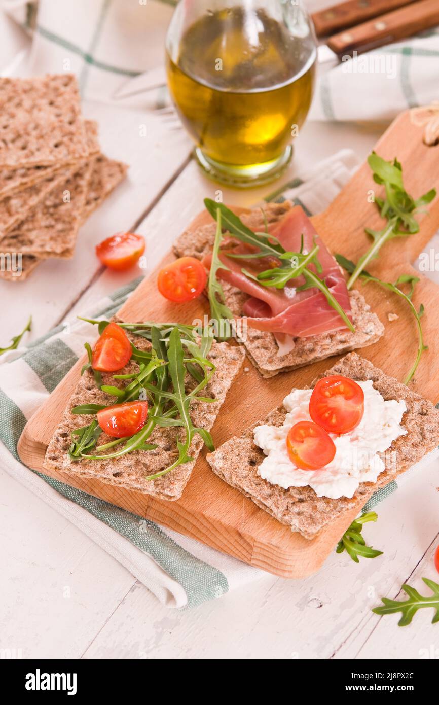 Crispy rye bread with sesame seeds, ham and cottage cheese Stock Photo ...
