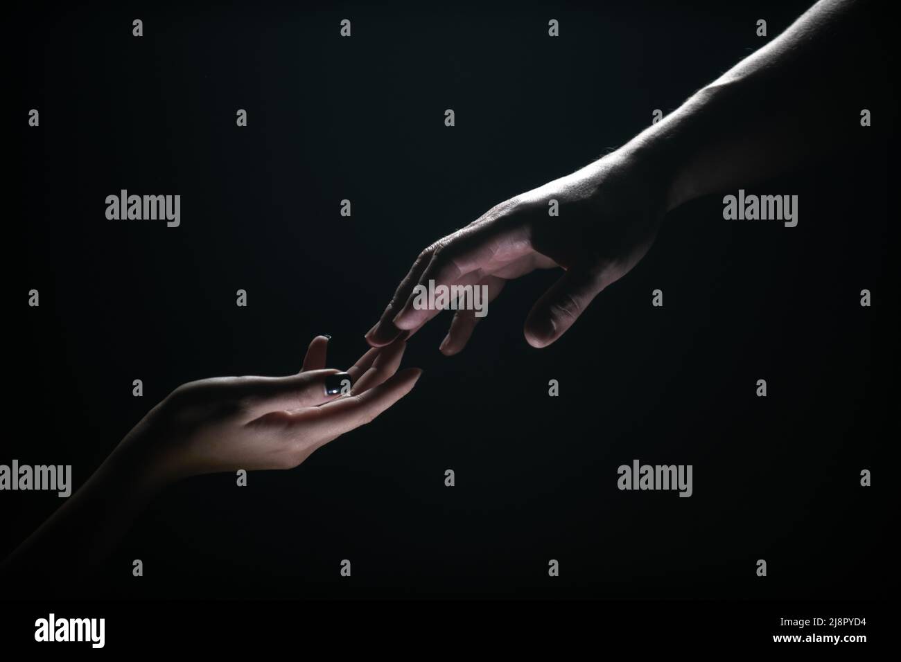 Two hands at the moment of farewell. Romantic touch with fingers, love ...