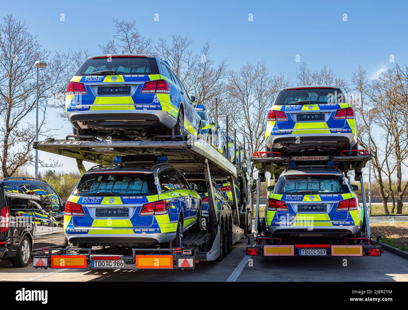 Car transporter with a load of new police cars for Germany Stock Photo ...
