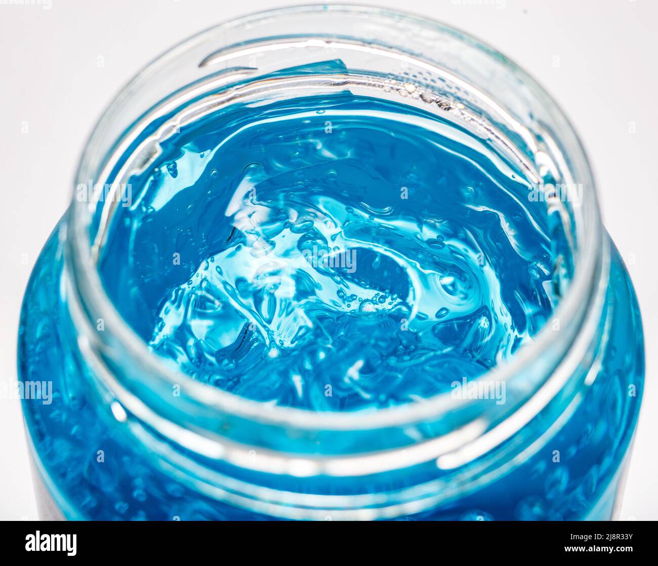Blue gel container isolated on white background from top view ...