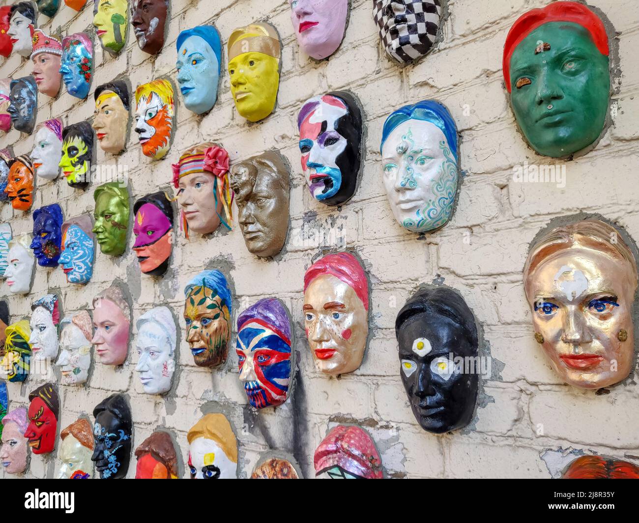 Moscow, Russia, 21 October 2019: Colorful painted ceramic faces ...