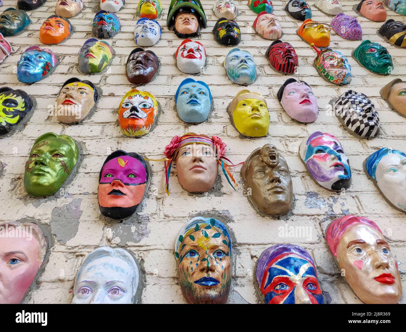 Moscow, Russia, 21 October 2019: Colorful painted ceramic faces ...