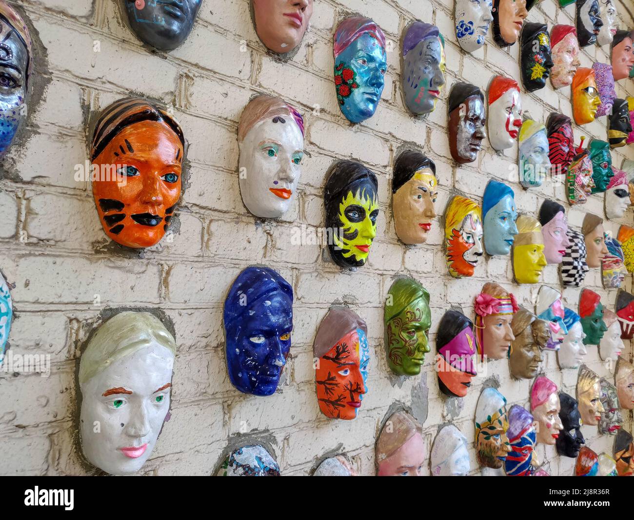 Moscow, Russia, 21 October 2019: Colorful painted ceramic faces ...