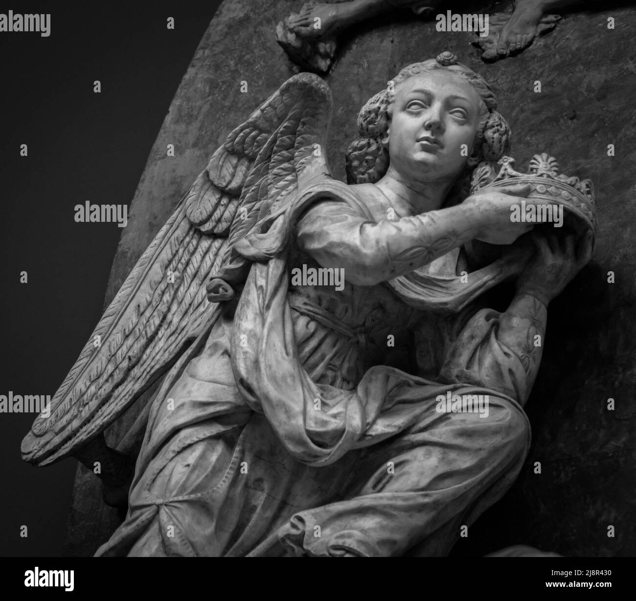 Detail of a stone angel on the facade of a medieval church Stock Photo ...