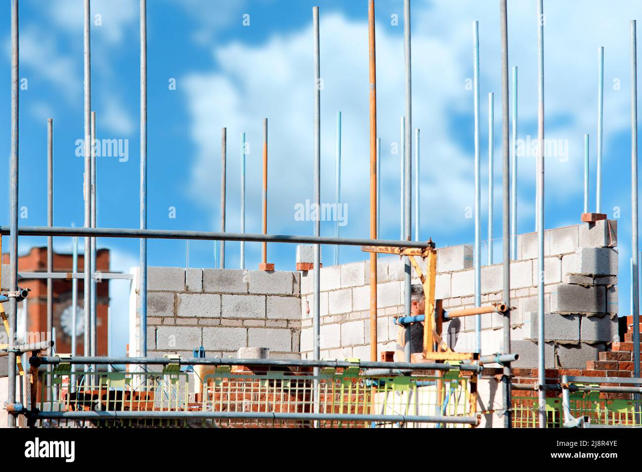 Scaffold installed around houses to provide access for bricklayers and ...