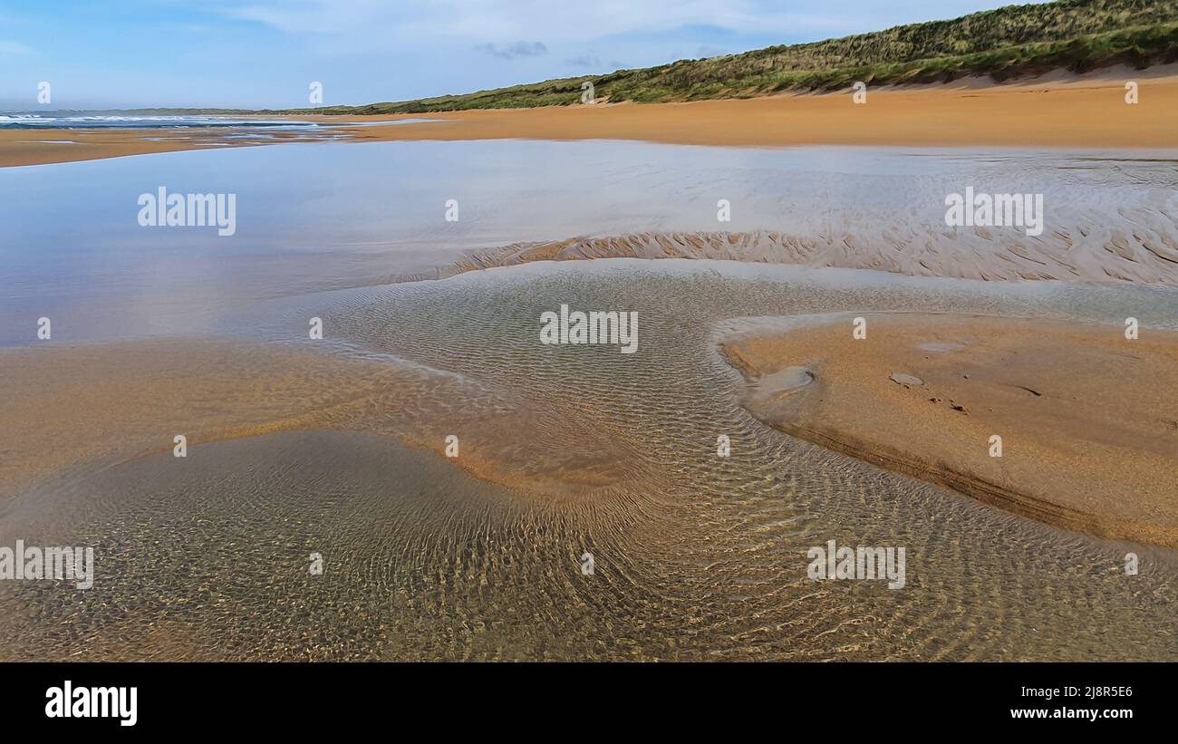 Patterns and textures of sea and sand Stock Photo - Alamy