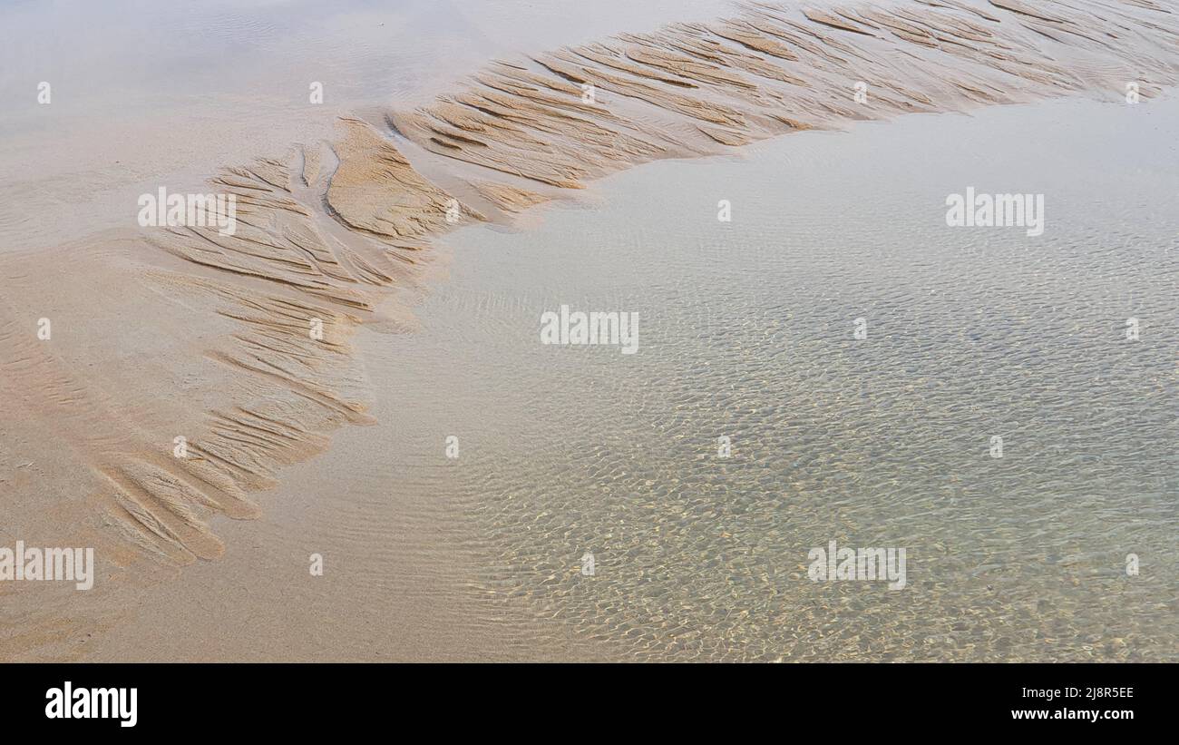 Patterns and textures of sea and sand Stock Photo - Alamy