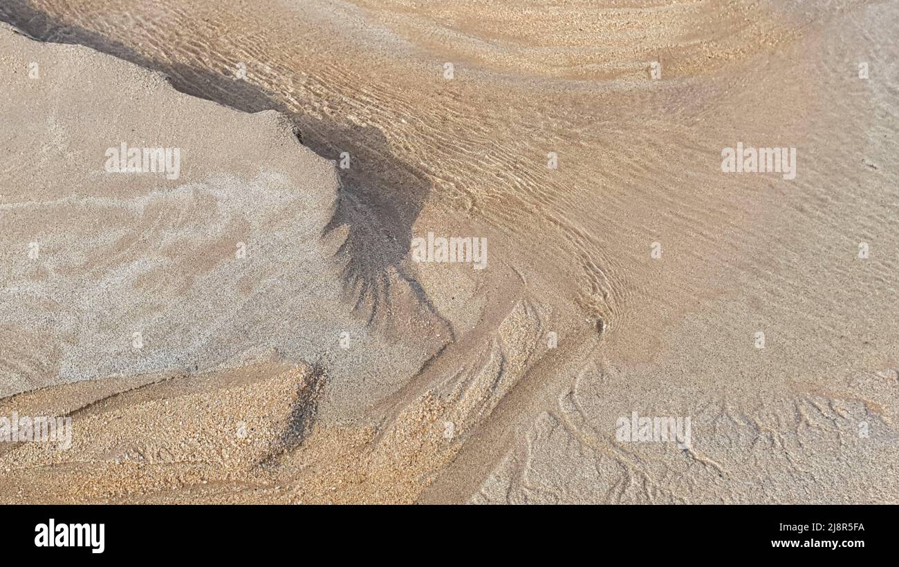 Patterns and textures of sea and sand Stock Photo - Alamy