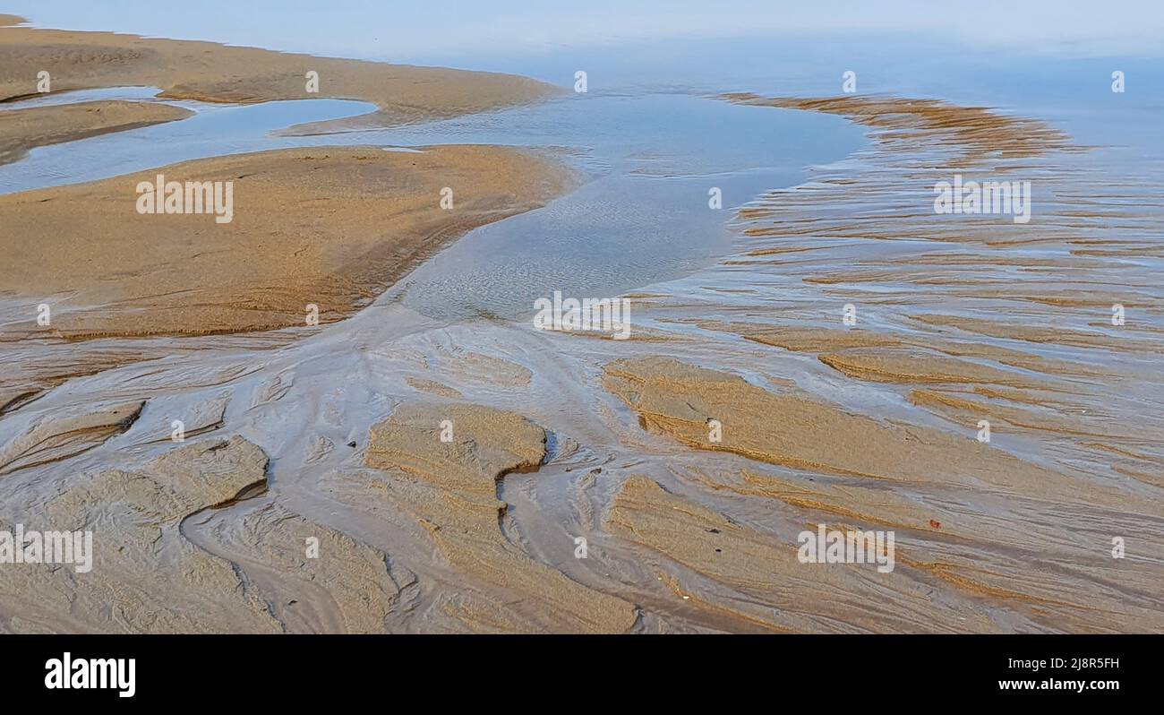 Patterns and textures of sea and sand Stock Photo - Alamy