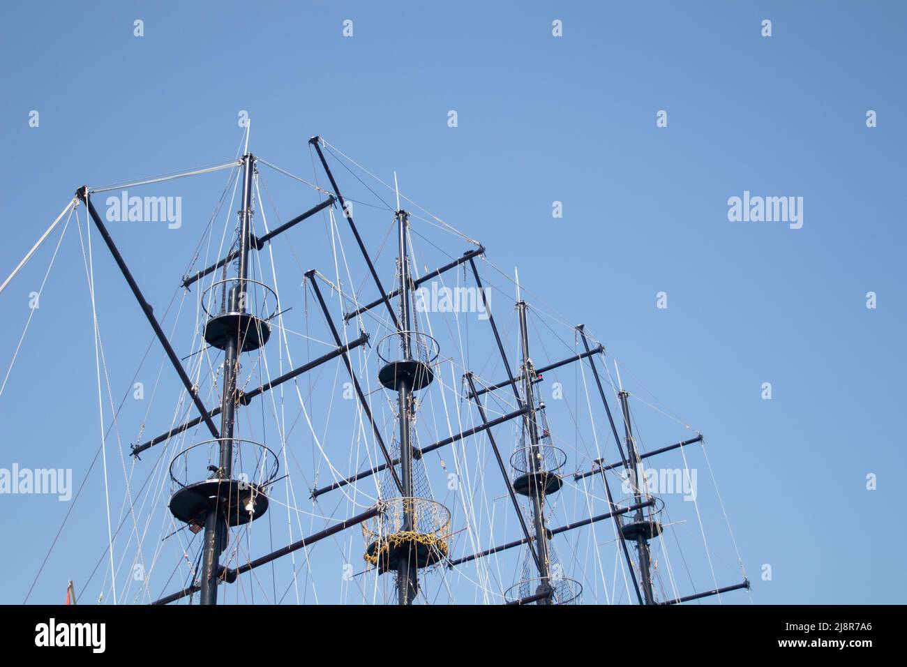 Ship mast and rigging without sails against a blue sky Stock Photo - Alamy
