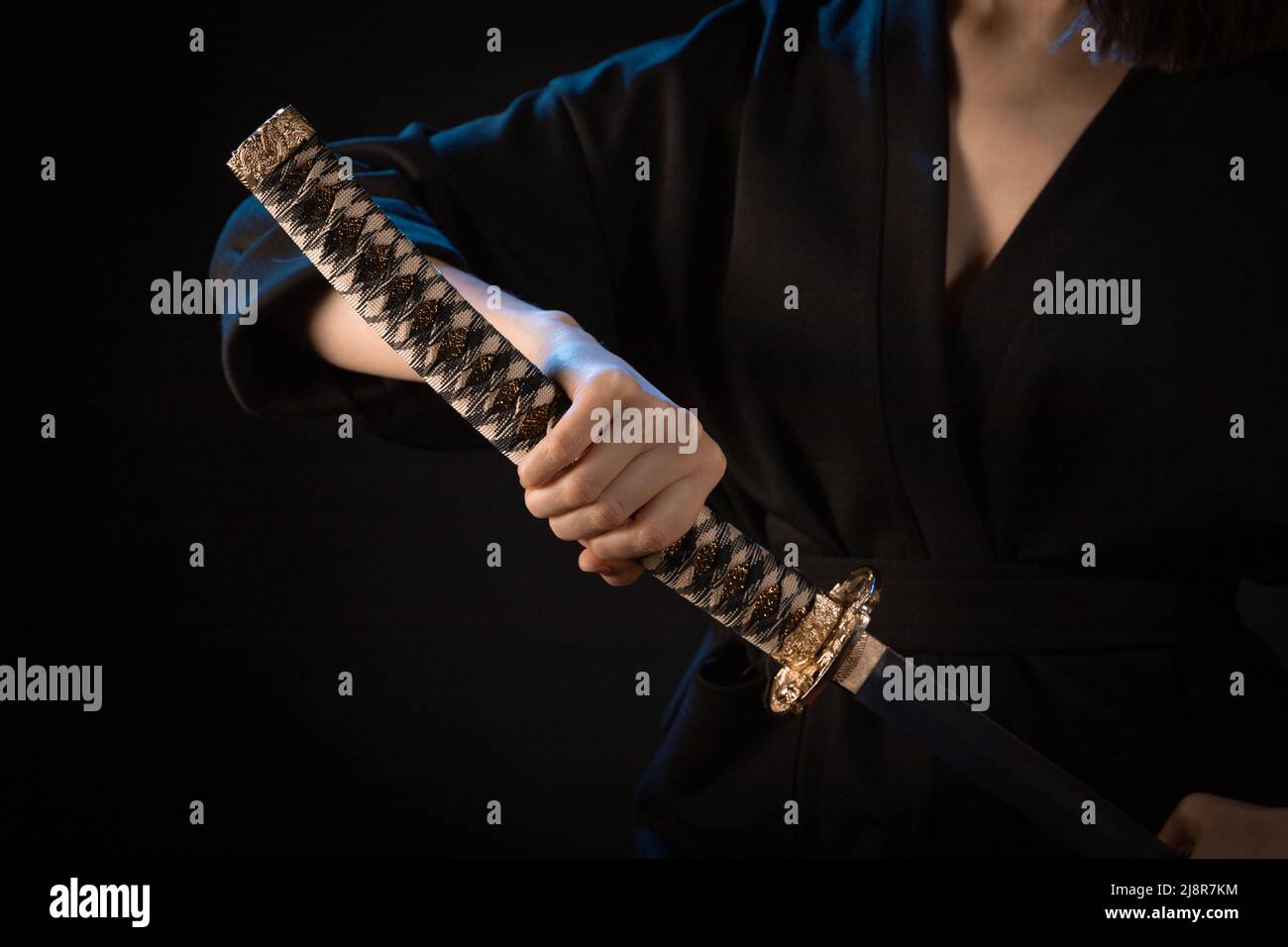 Hand holding sword hilt hi-res stock photography and images - Alamy