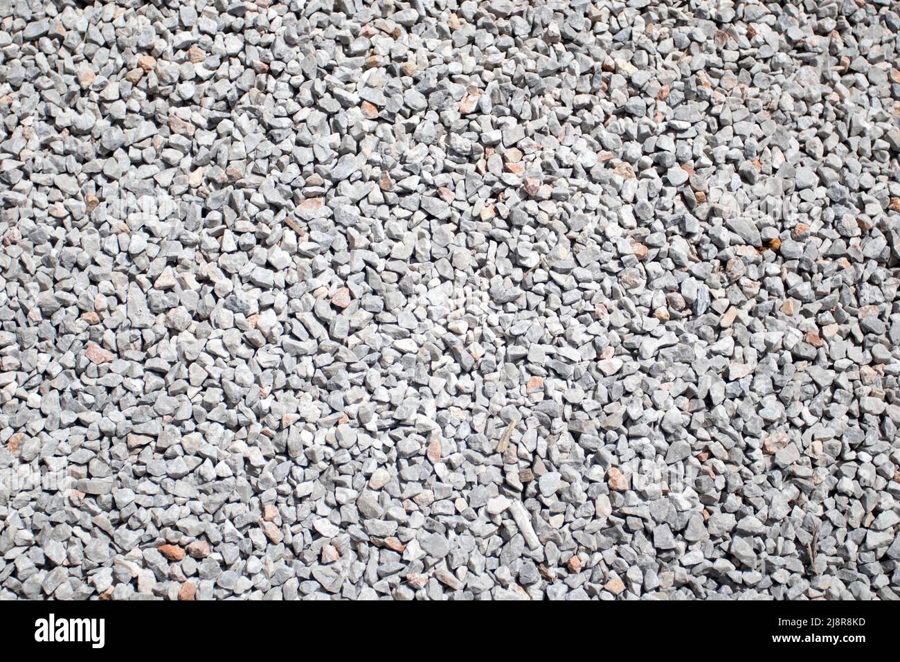 Gray gravel stones rubble background texrure Stock Photo - Alamy
