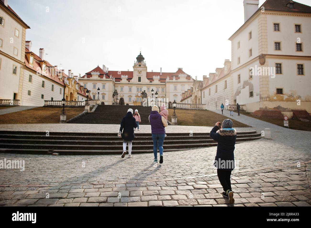 Mother with four kids has a tour at Valtice castle, Czech Republic ...