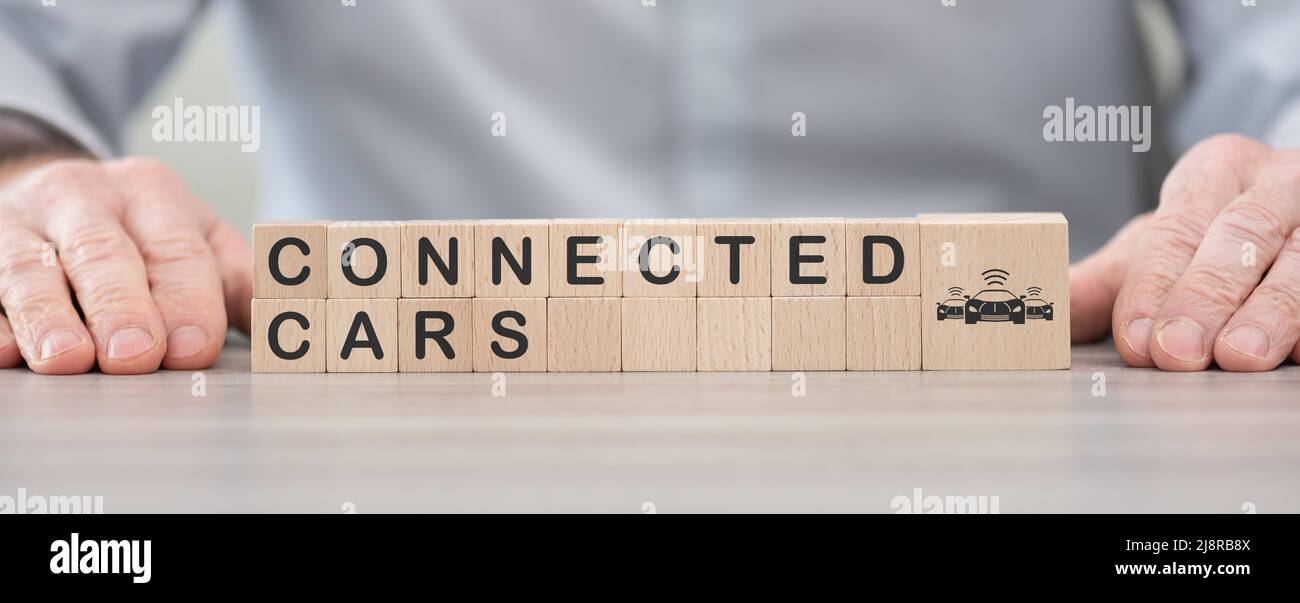 Wooden blocks with symbol of connected cars concept Stock Photo - Alamy