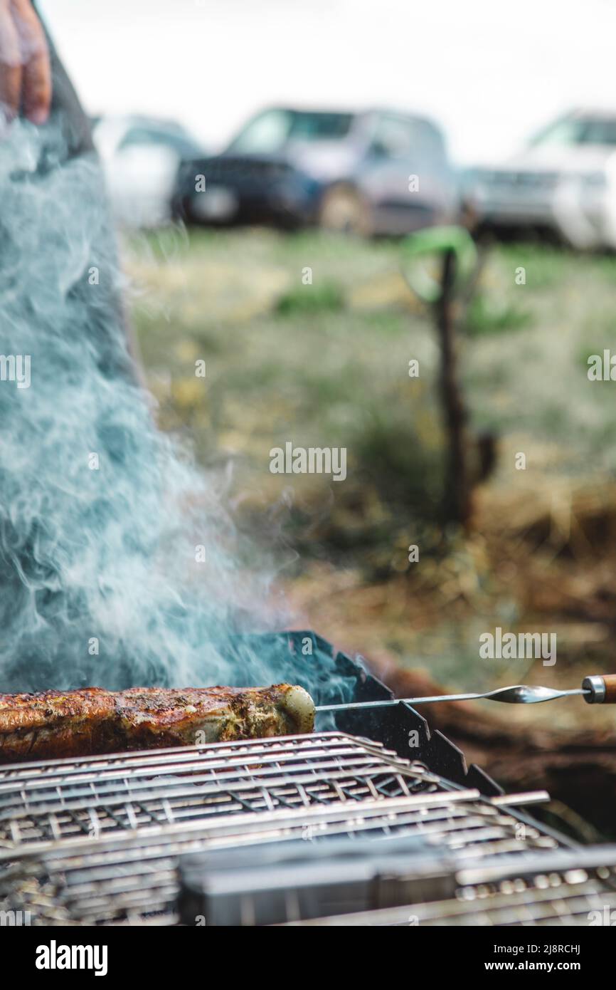 cooking meat at campfire close up. camping concept Stock Photo - Alamy