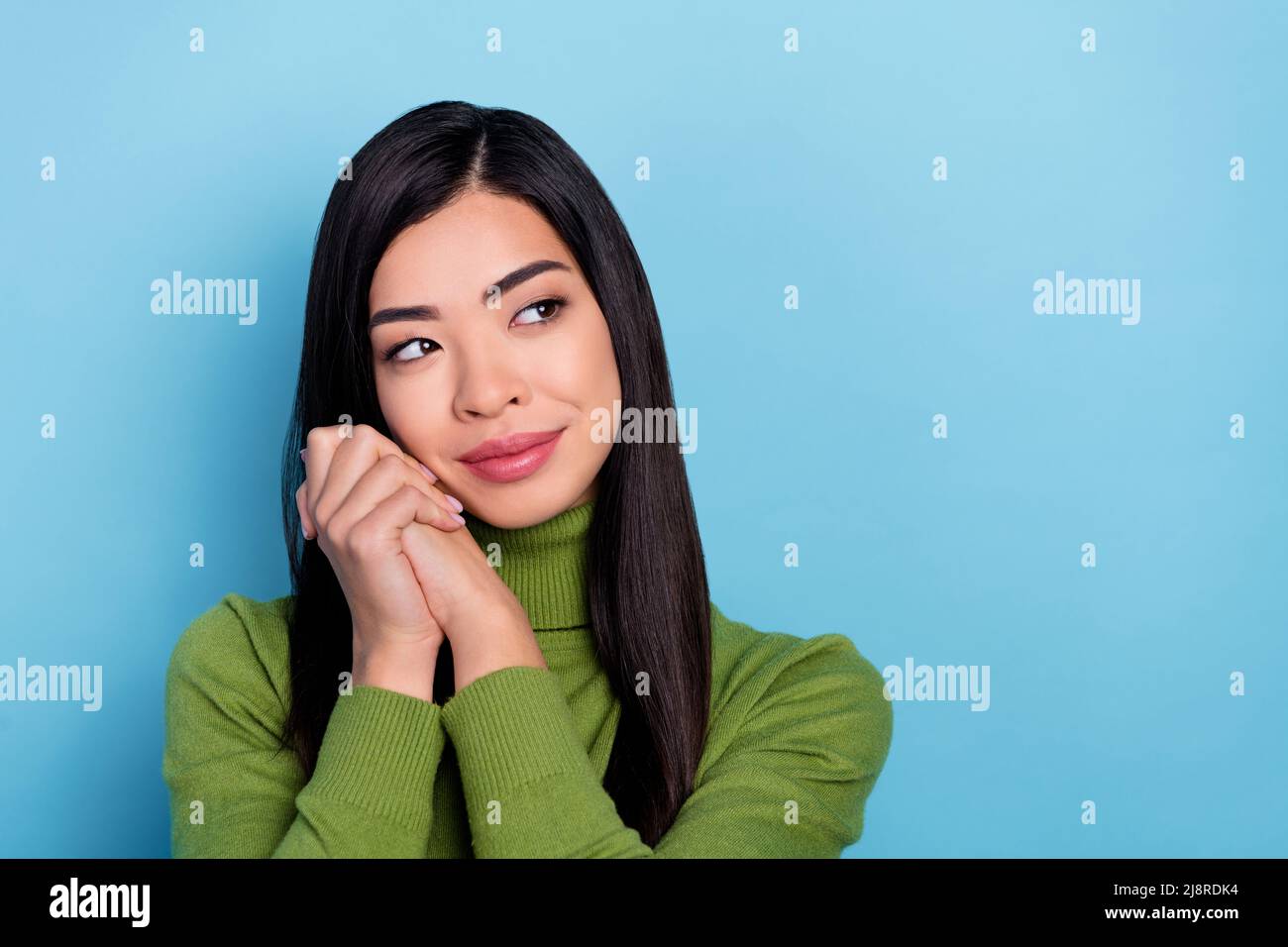 Portrait of attractive calm cute minded long-haired girl thinking copy ...