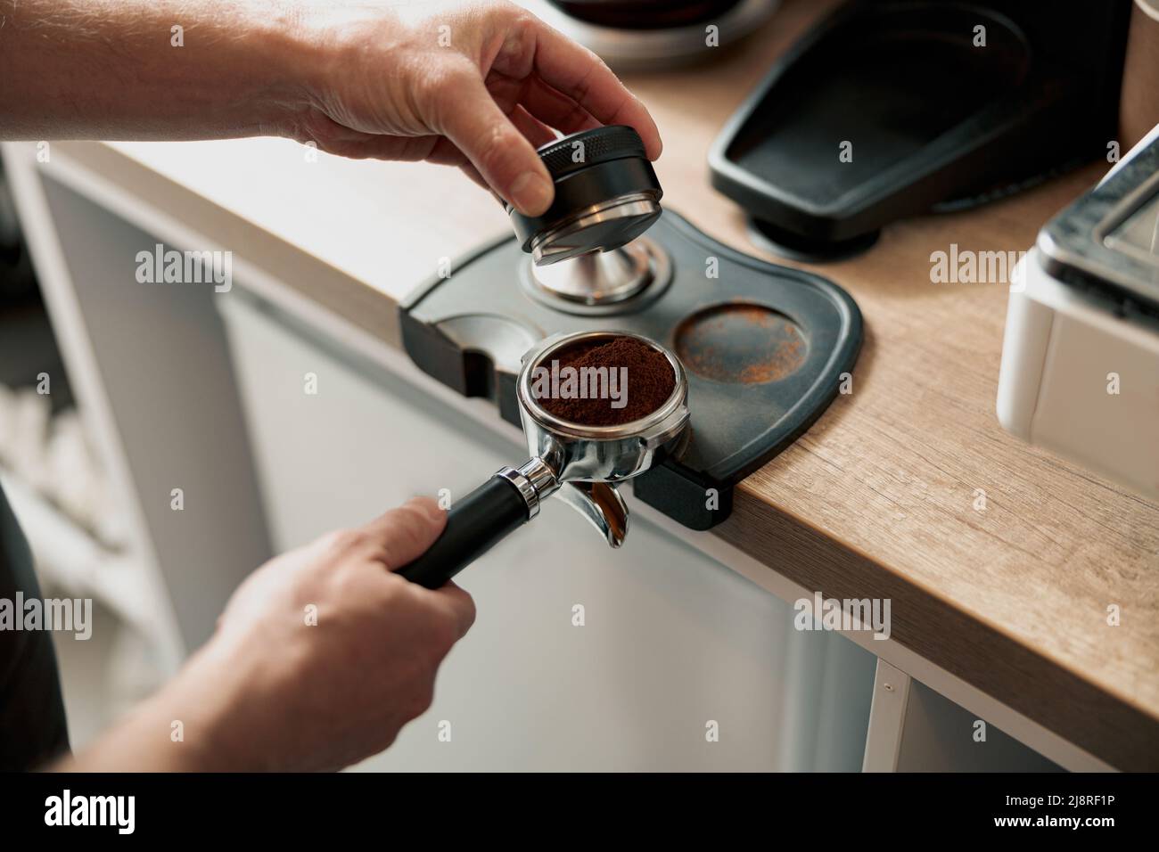 Process of preparing coffee tablet before inserting it into the coffee ...