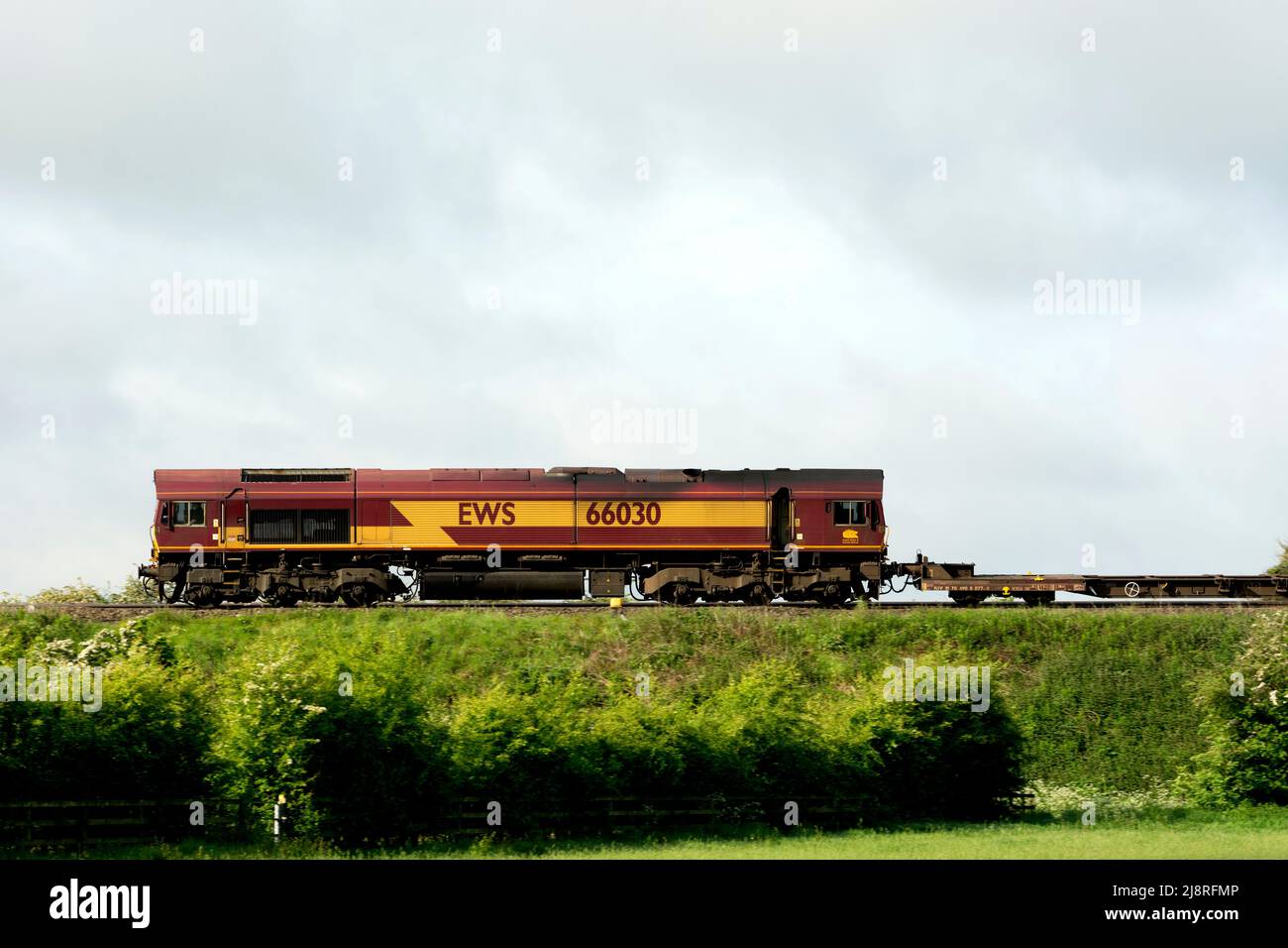 EWS class 66 diesel locomotive No. 66030 pulling a freightliner train ...