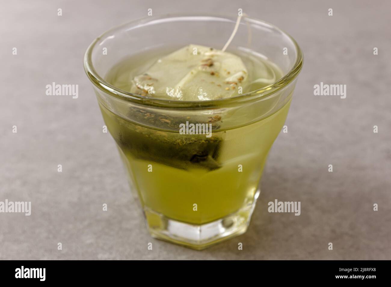 Green tea with bitter and fragrant green leaves Stock Photo - Alamy
