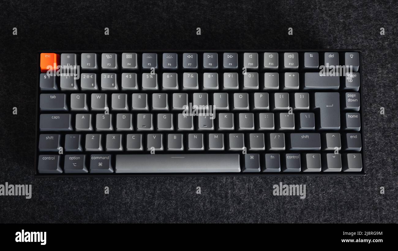 LONDON - APRIL 11, 2022: Keychron mechanical computer keyboard in dark ...