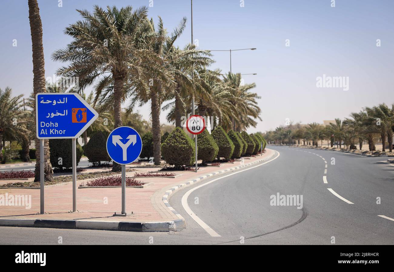 Al Ruwais, Qatar. 02nd Apr, 2022. A traffic sign for Doha stands at a ...