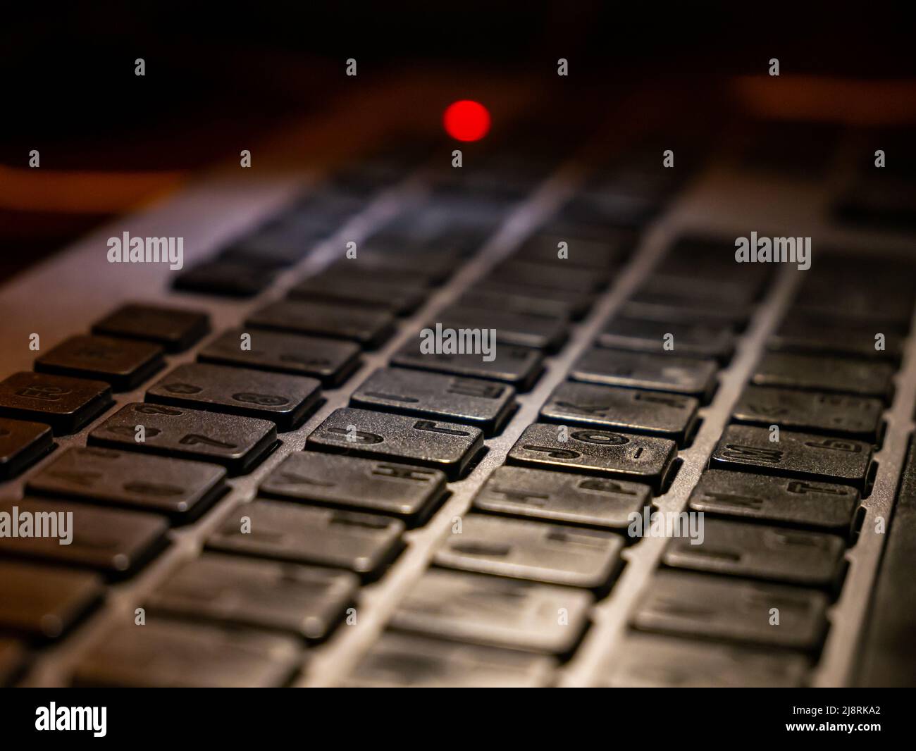 Backlit keyboard, grey color pc close up Stock Photo - Alamy