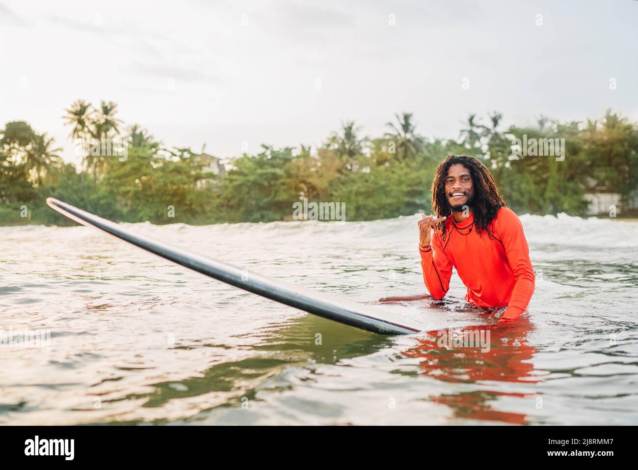 Surfboard Floating On Water