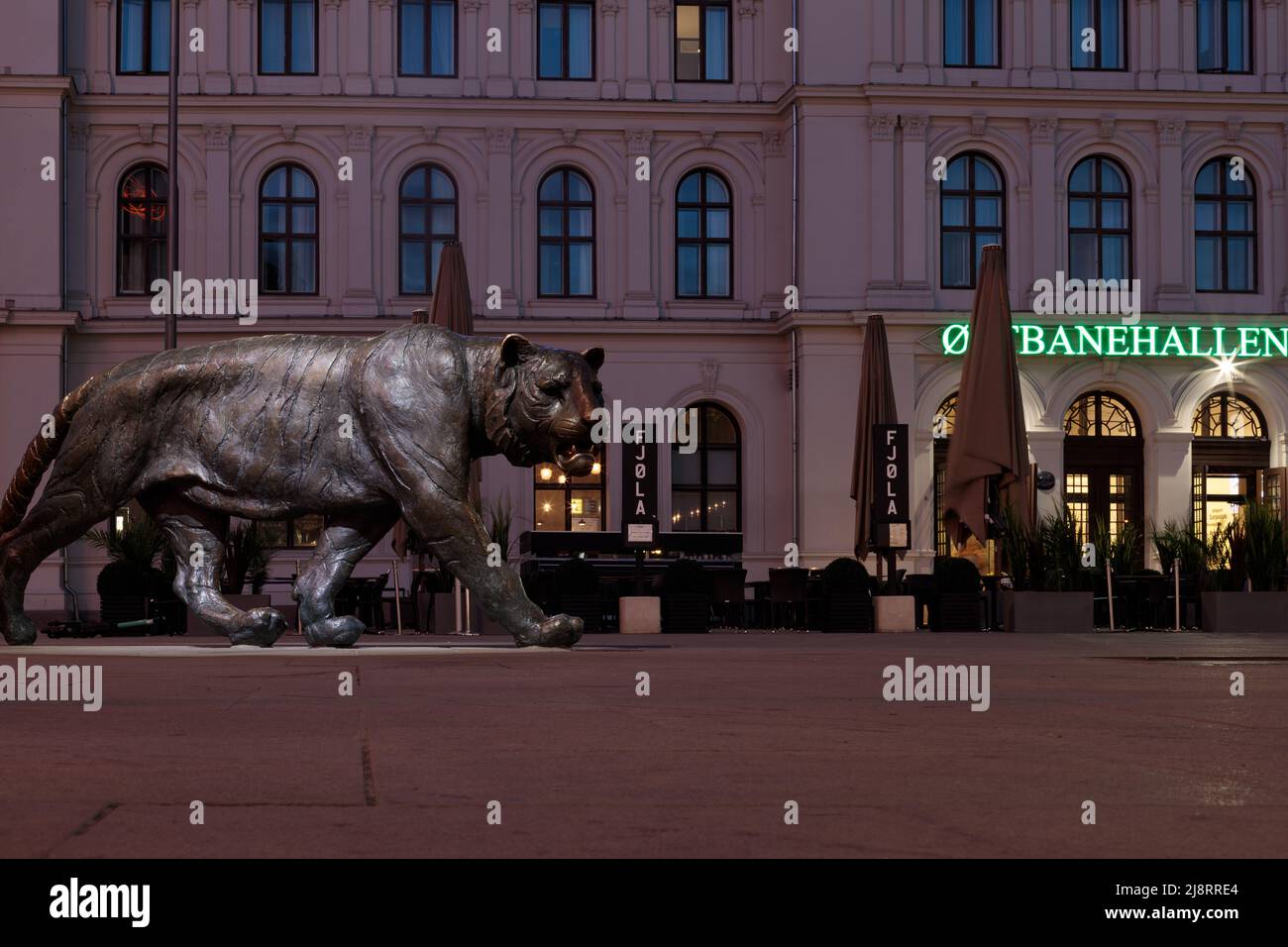Oslo, Norway. 01 May 2022: Sculpture of iron tiger in the main square ...