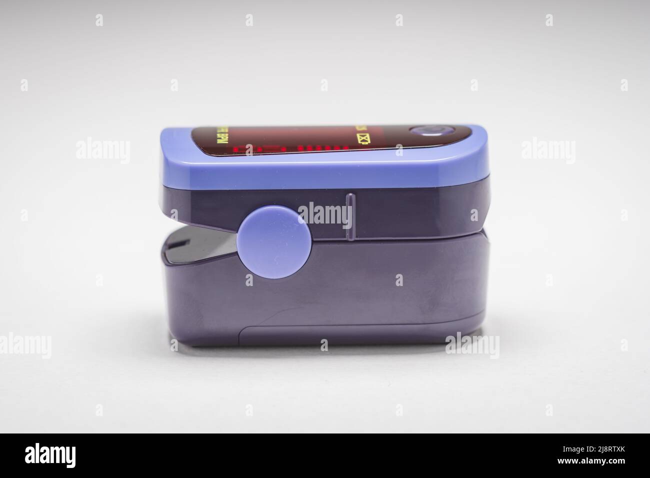 Pulse oximeter device isolated in England UK Stock Photo - Alamy