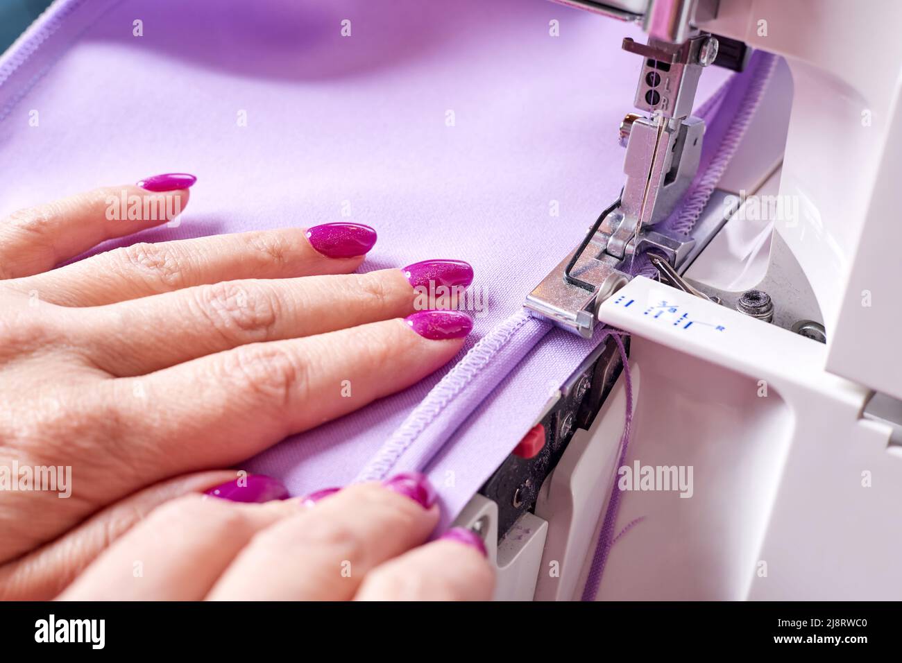 Overlocker sewing machine hi-res stock photography and images - Alamy