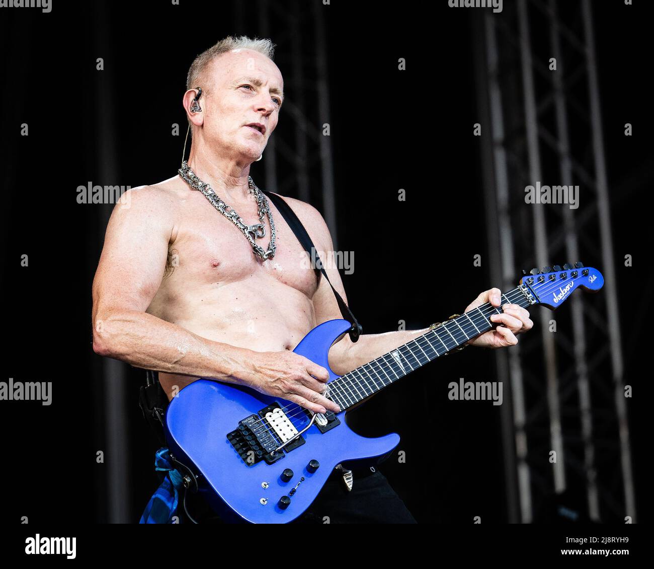 Phil Collen of Def Leppard performing live on stage Stock Photo - Alamy