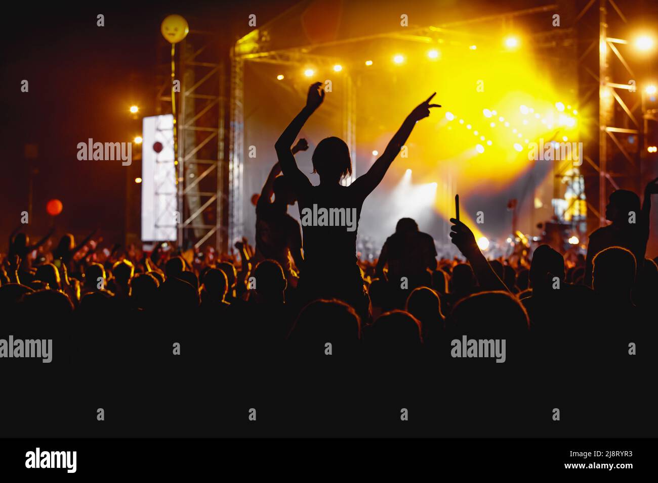 Happy crowd at a music festival Stock Photo - Alamy