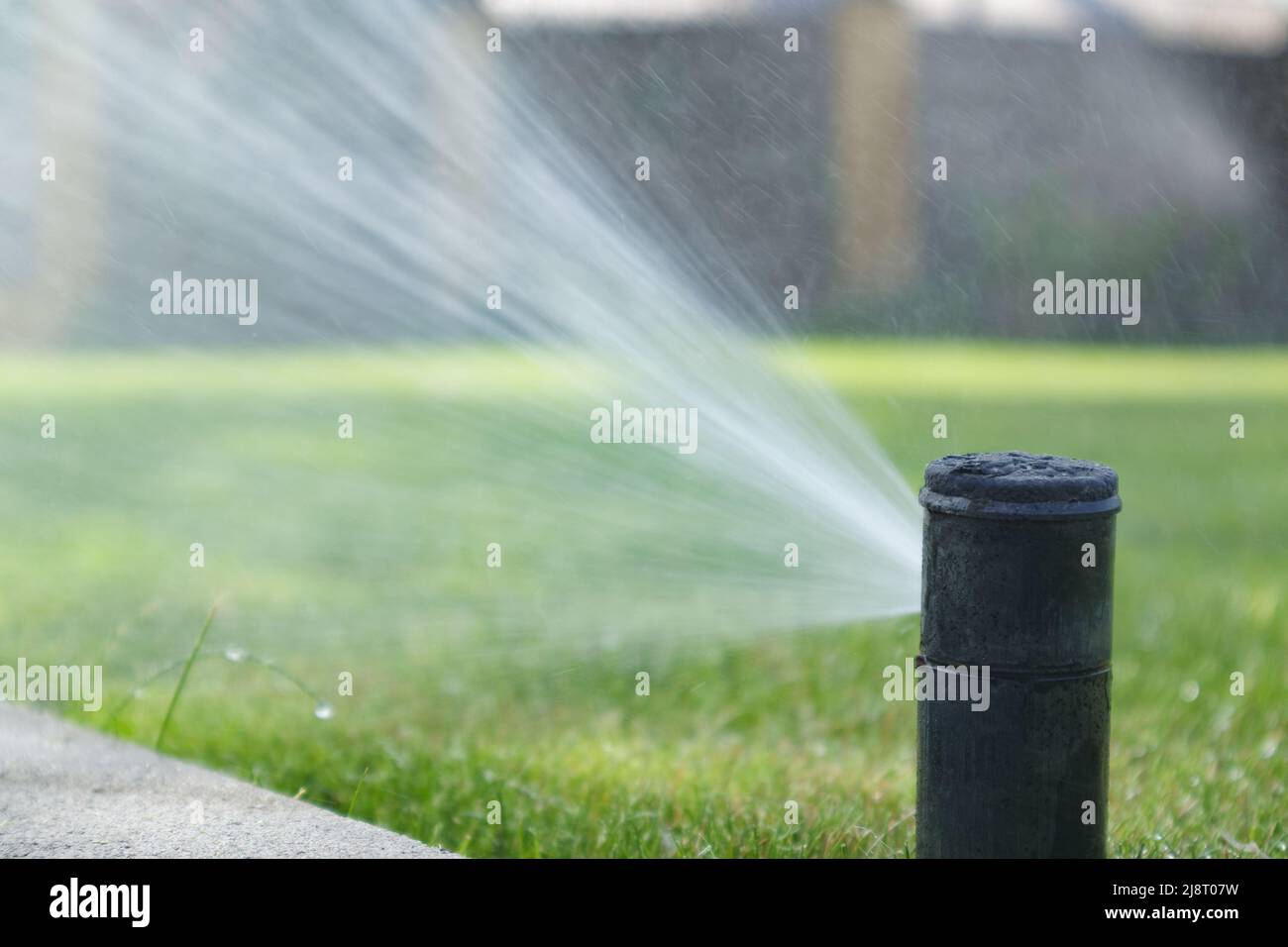 Garden irrigation system lawn. Automatic lawn sprinkler watering green ...